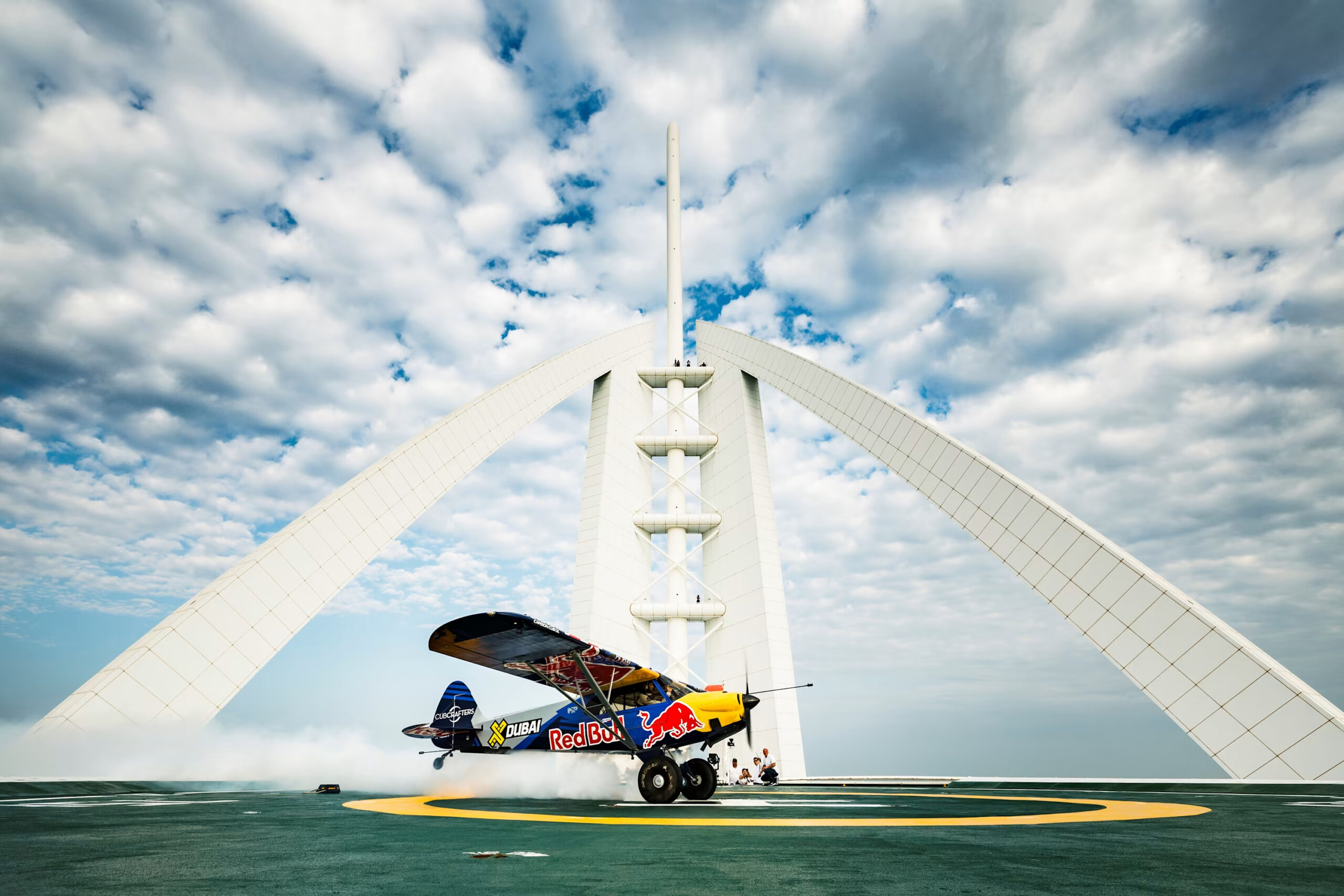 Watch a Plane Land on a Skyscraper Helipad | The Drive