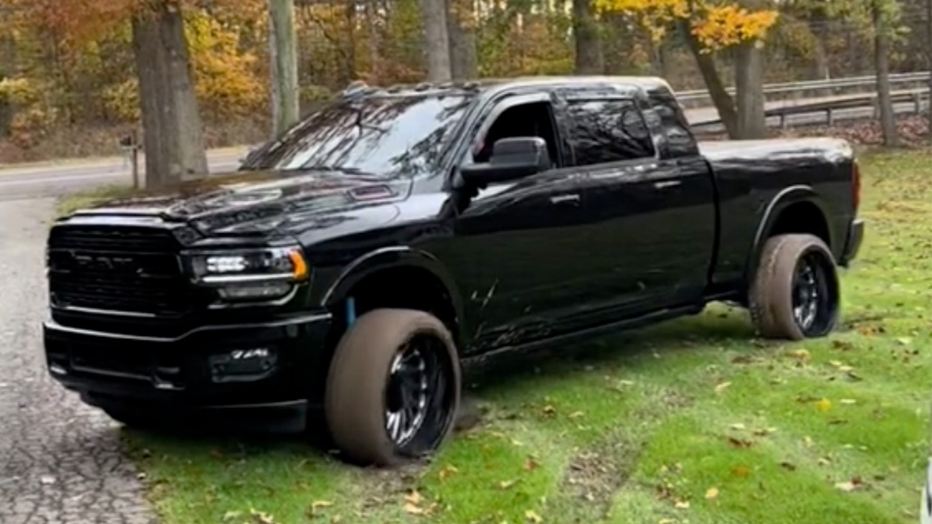Watch a Ram 2500 Bro Truck Get Stuck on Wet Grass, Rescued by a UTV