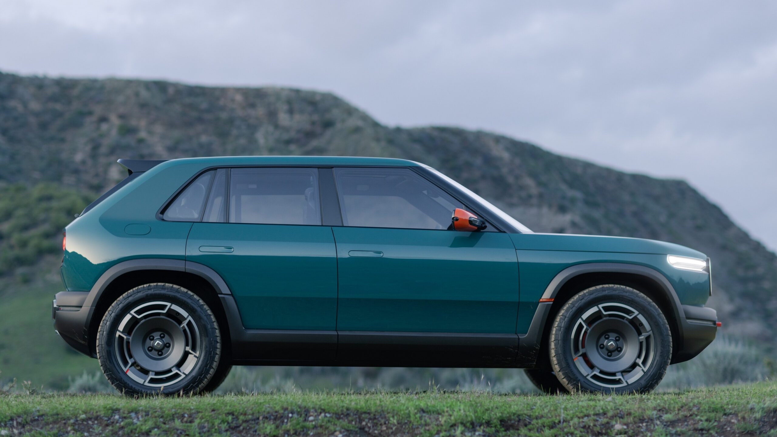 Rivian R3 Is a Cyberpunk AMC Gremlin With a Jacked-Up R3X Performance ...