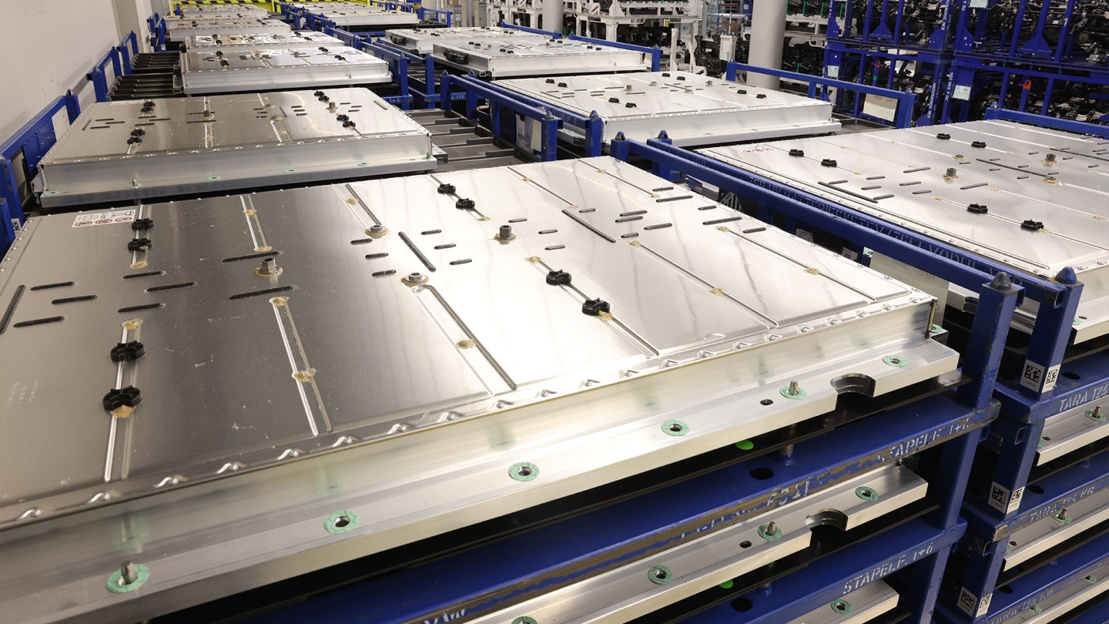Automakers Scrambling to Build US Battery Plants Amid EV Tax Credit Revamp