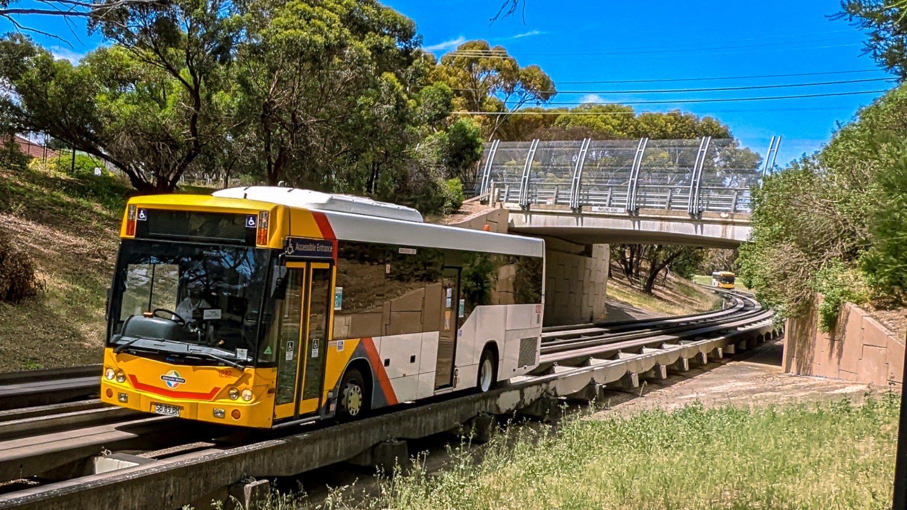 An Australian O-Bahn Mass Transit System Combines Buses, Trains, and ...