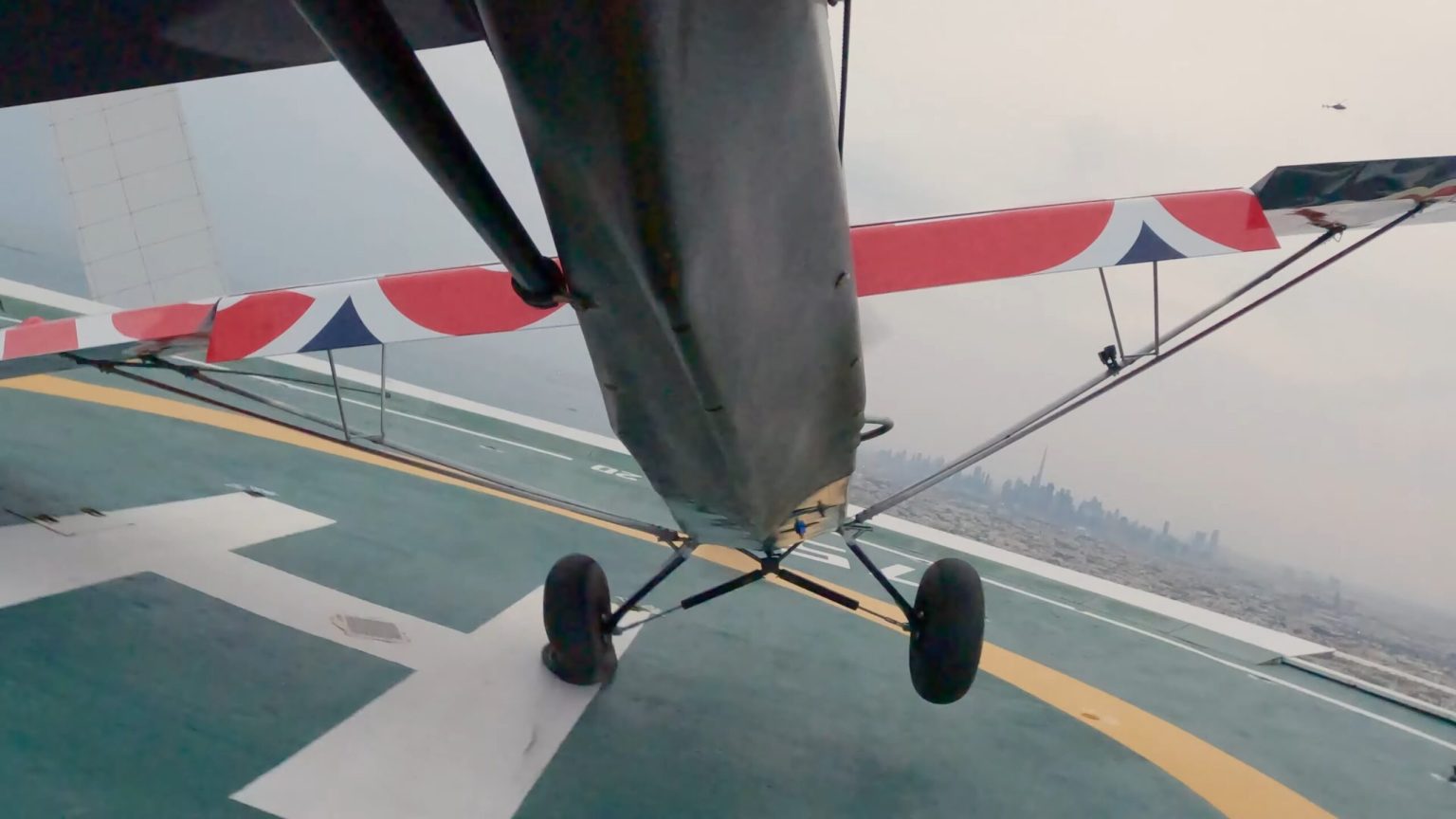 Watch a Plane Land on a Skyscraper Helipad