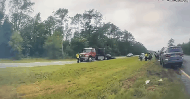 Nissan Altima Driver Ramps Off Parked Tow Truck, Hits Another Altima