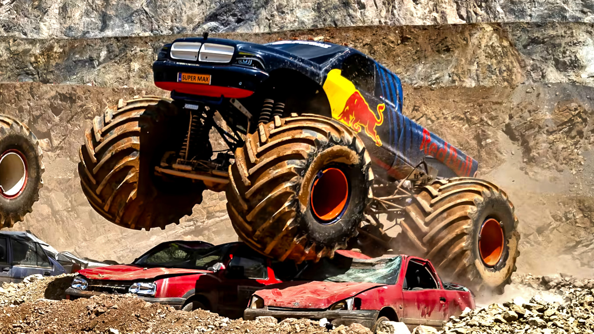 Watch Red Bull’s F1 Drivers Wheel Monster Trucks On Dirt