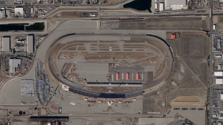 A Warehouse Complex Is Erasing NASCAR's Auto Club Speedway Turn by Turn