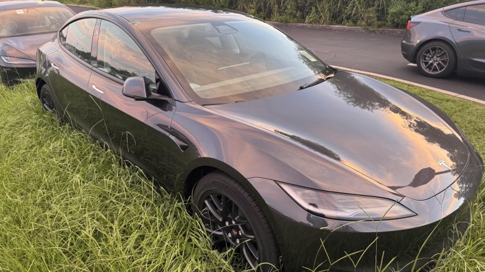 Tesla Is Stocking Unsold, Brand-New Model 3s in an Overgrown Field in ...