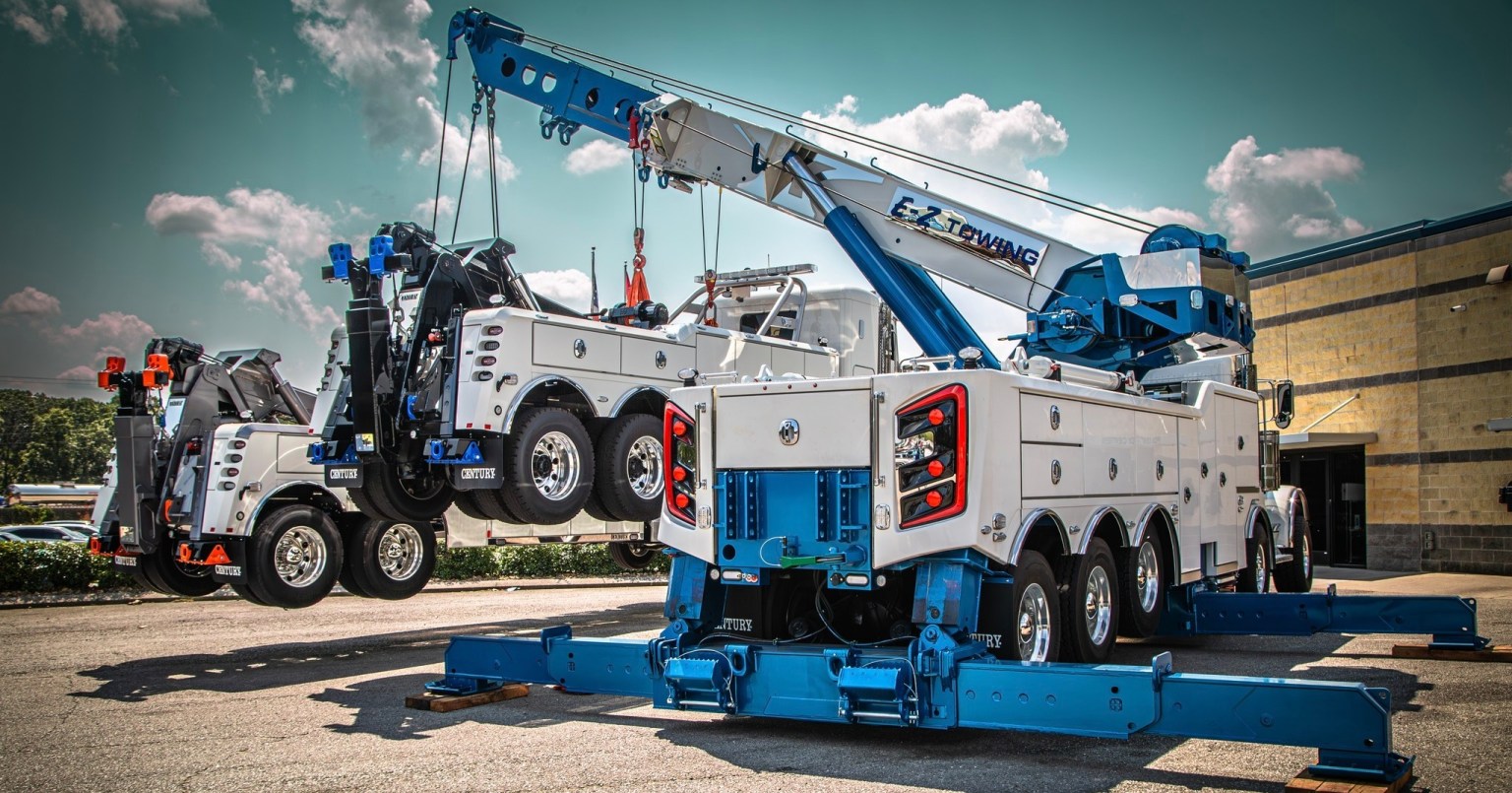 Just Look at the World’s Largest Rotator Tow Truck Lifting Two Other ...