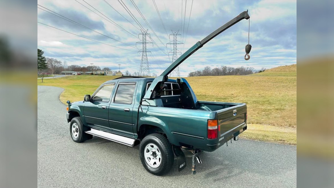 Ridiculously Rare Toyota Hilux With Factory Bed Crane Option Turns Up ...