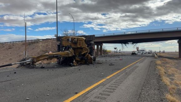 Excavator on Trailer Decimates Highway Overpass at Interstate Speeds