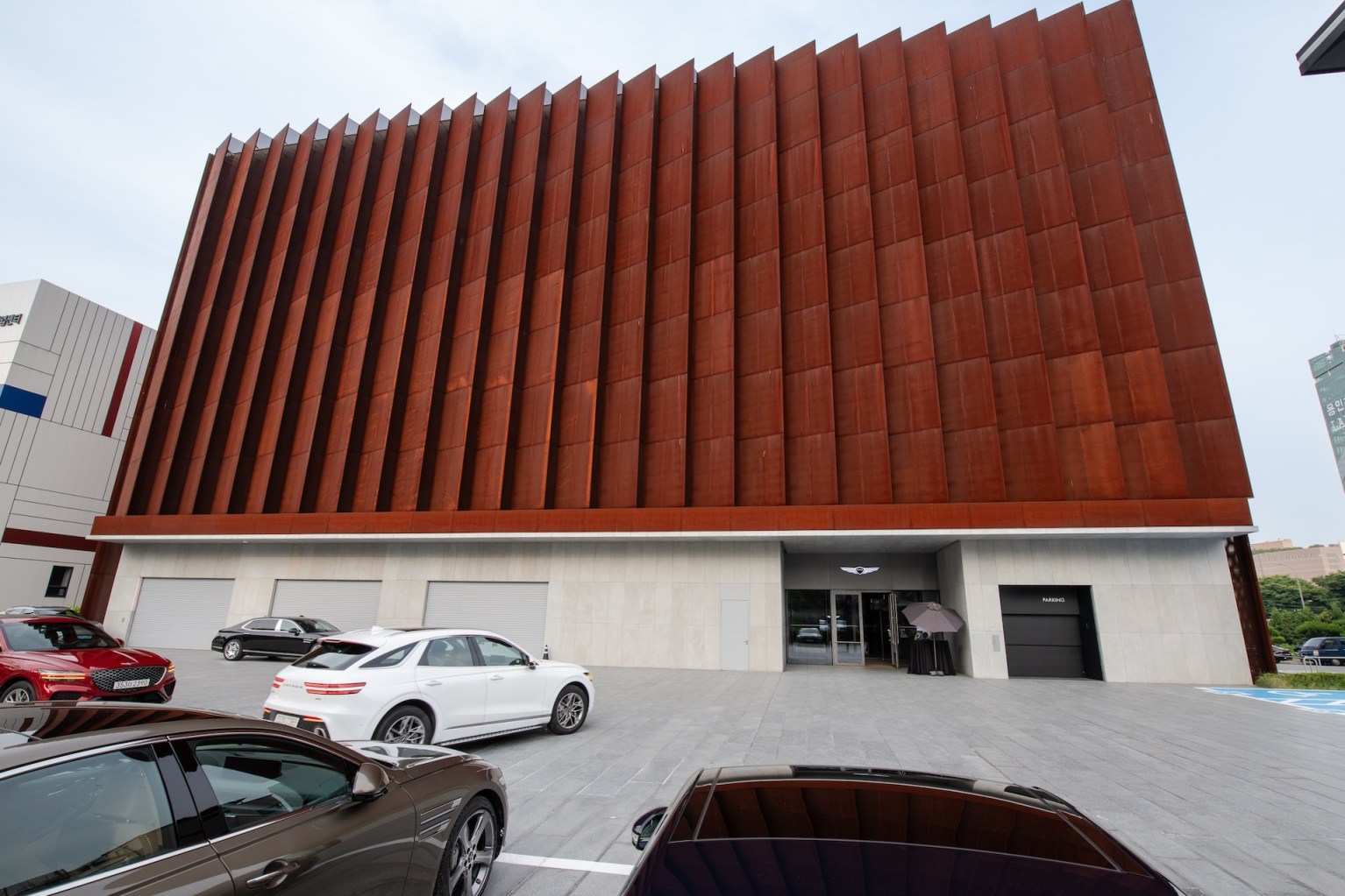 World's Largest Genesis Showroom: Come for the Cars, Stay for the Tea