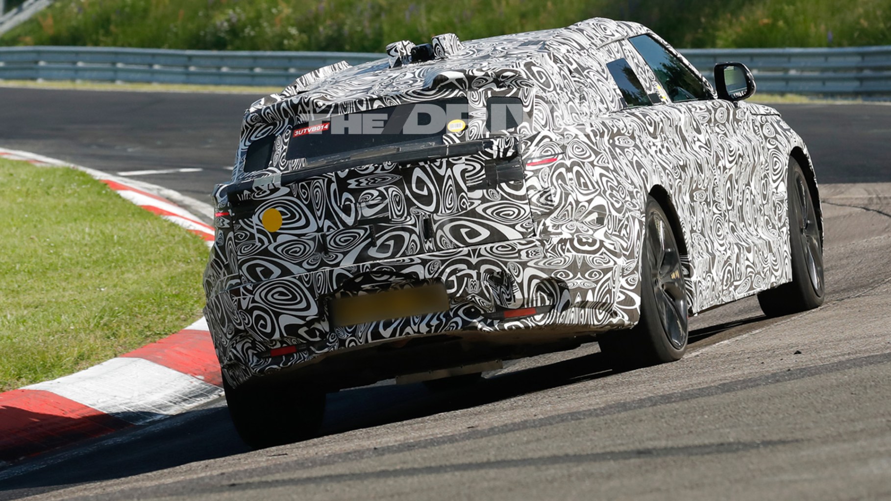 Range Rover Velar EV Spied With Weird Aero and Cladding