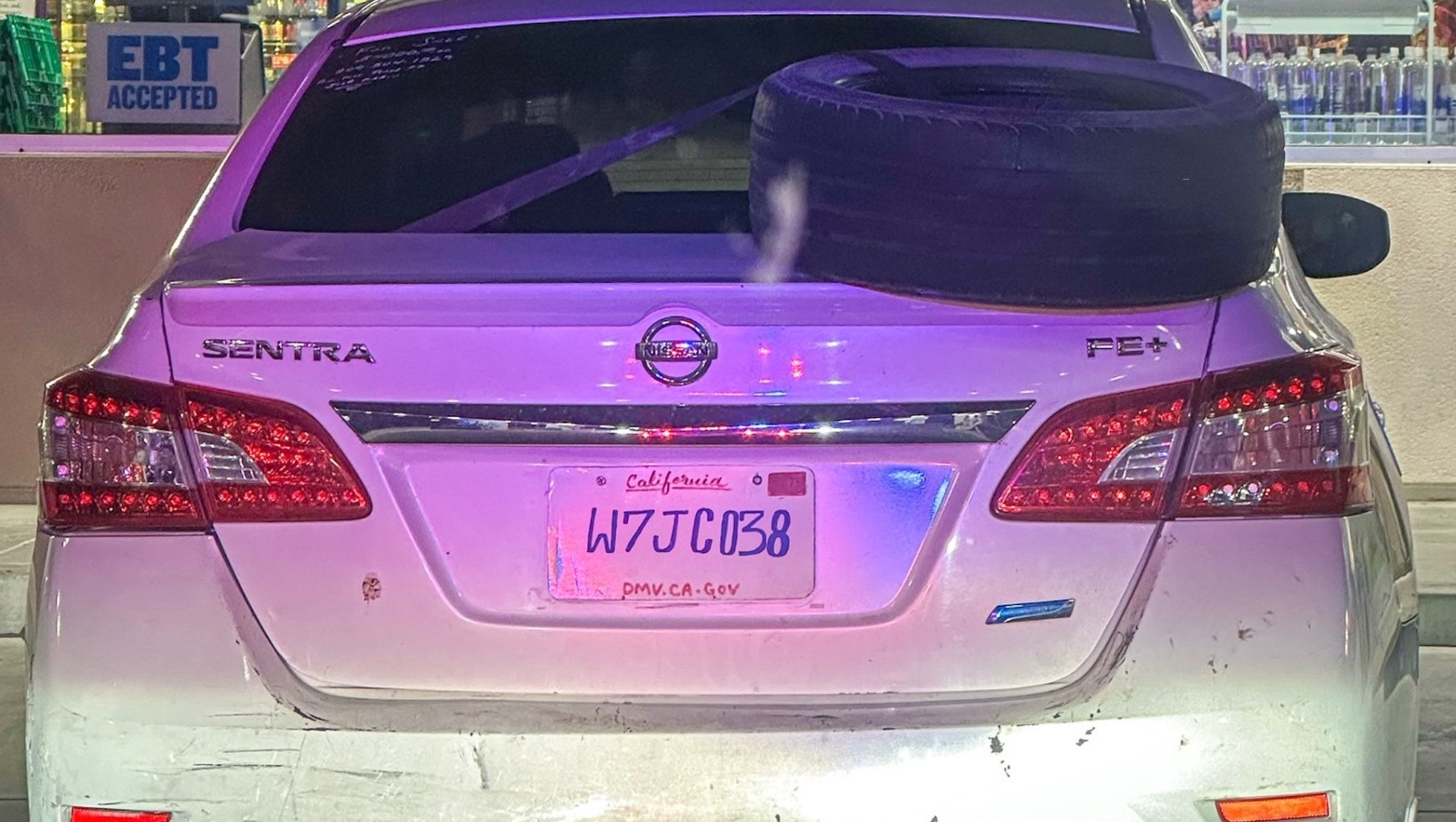 The Artist Behind This Nissan's Homemade License Plate Did Their Best ...