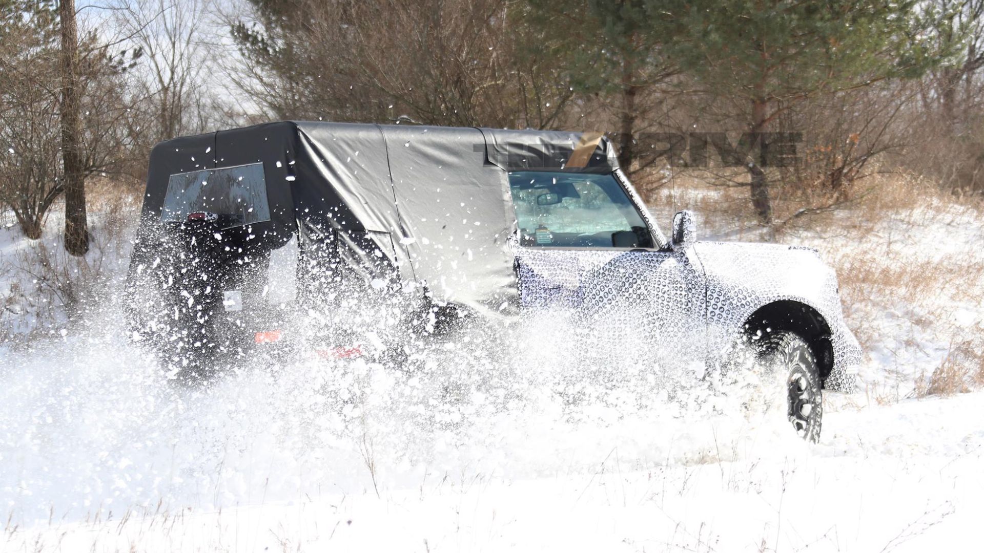 Here's The Two-Door 2021 Ford Bronco Jumping Through The Snow