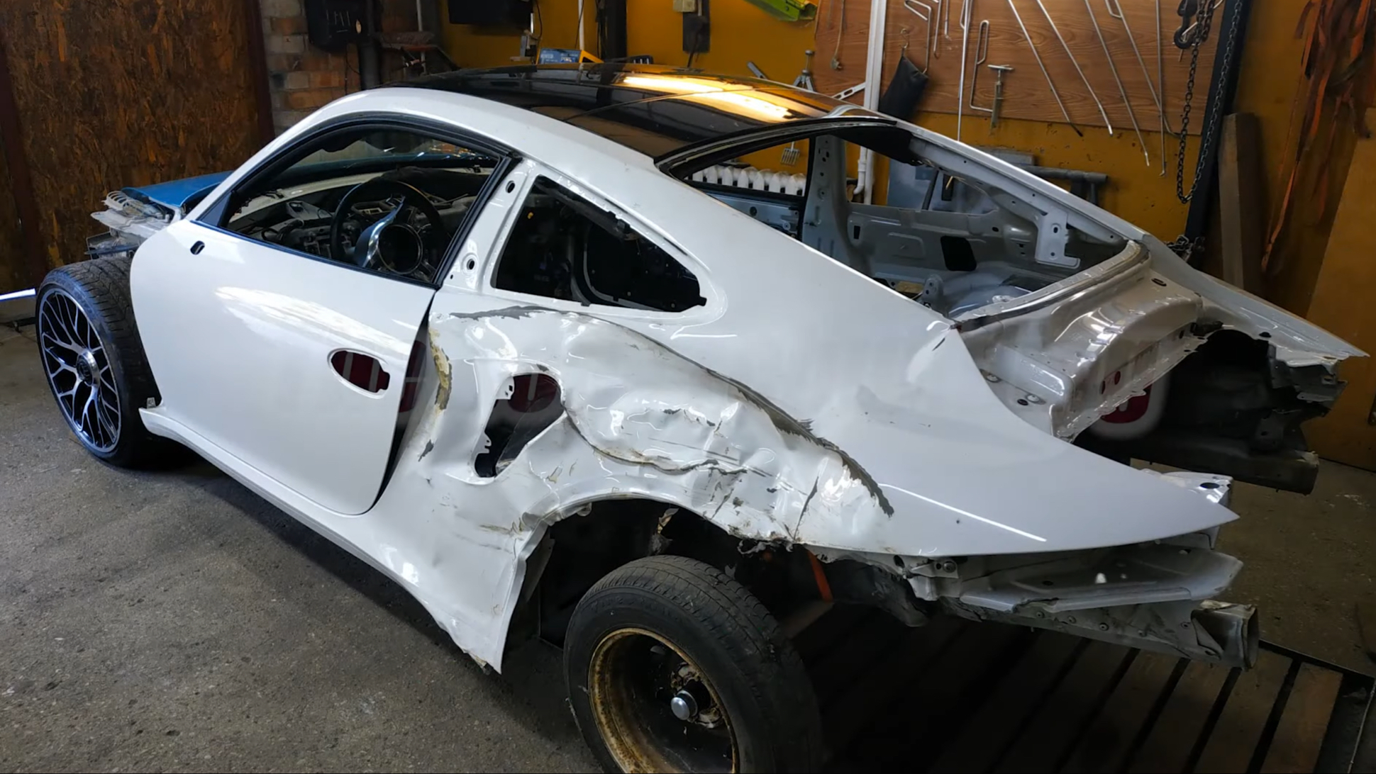 Watch a Body Shop Combine Multiple Porsche 911s to Resurrect One ...