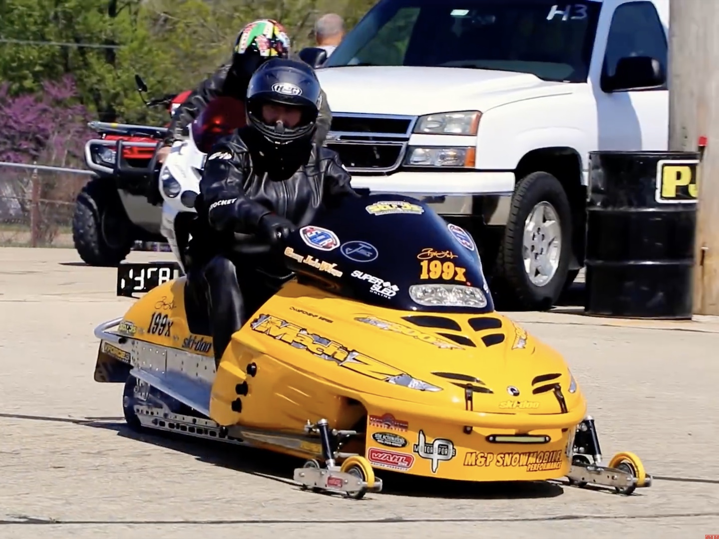 Watch a Modified Snowmobile Keep Up With a Hayabusa at the Drag Strip