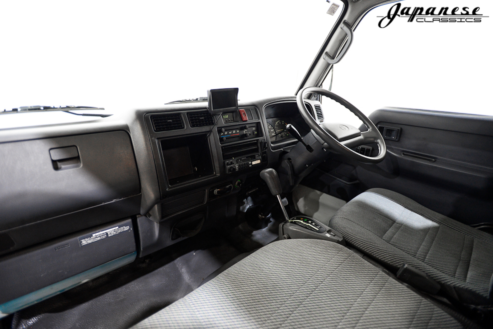 Buy This 1996 Toyota Camper With Retro Racing Livery and Rule the Infield