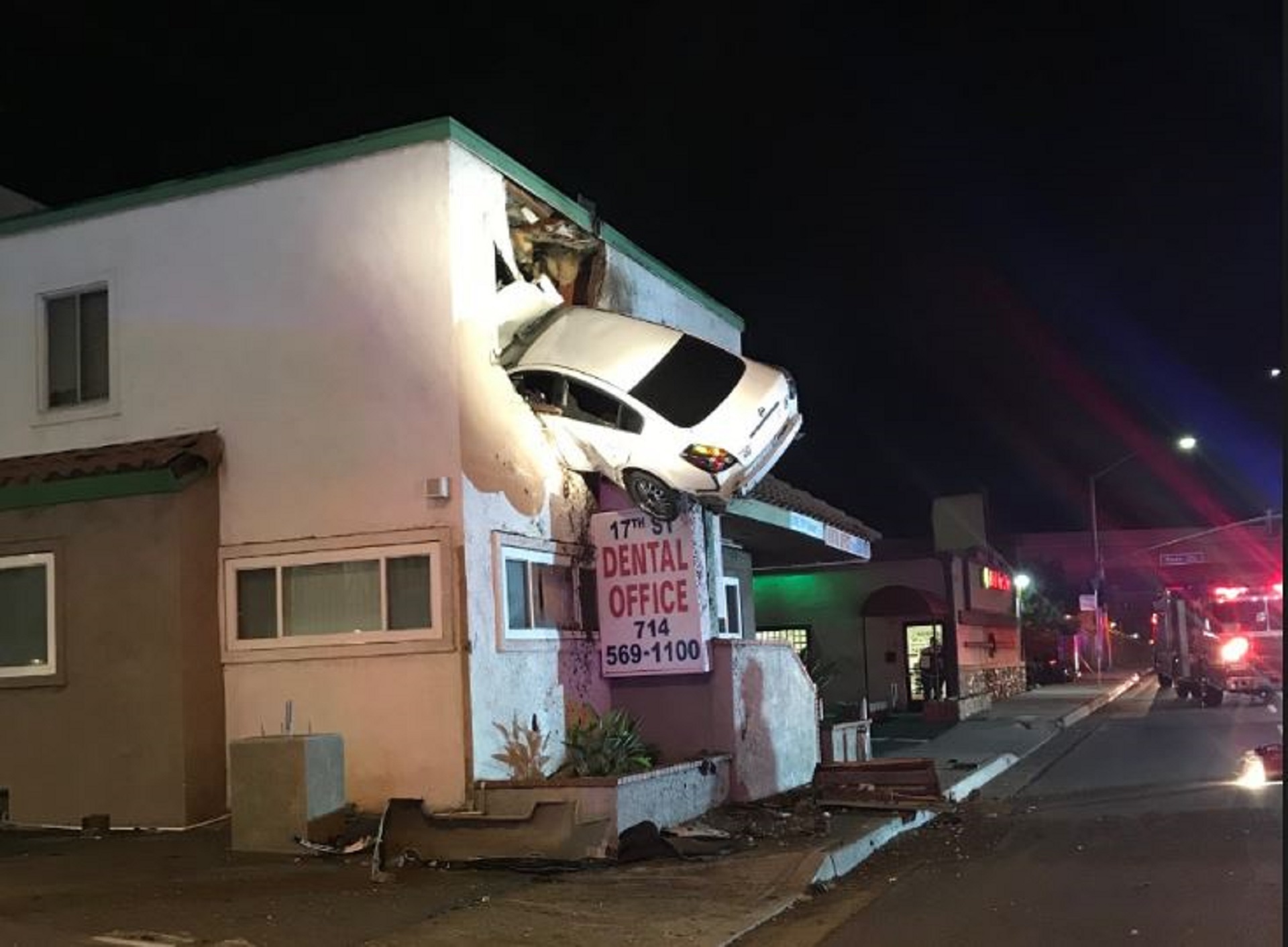 Car Crashes into 2nd Floor of Building