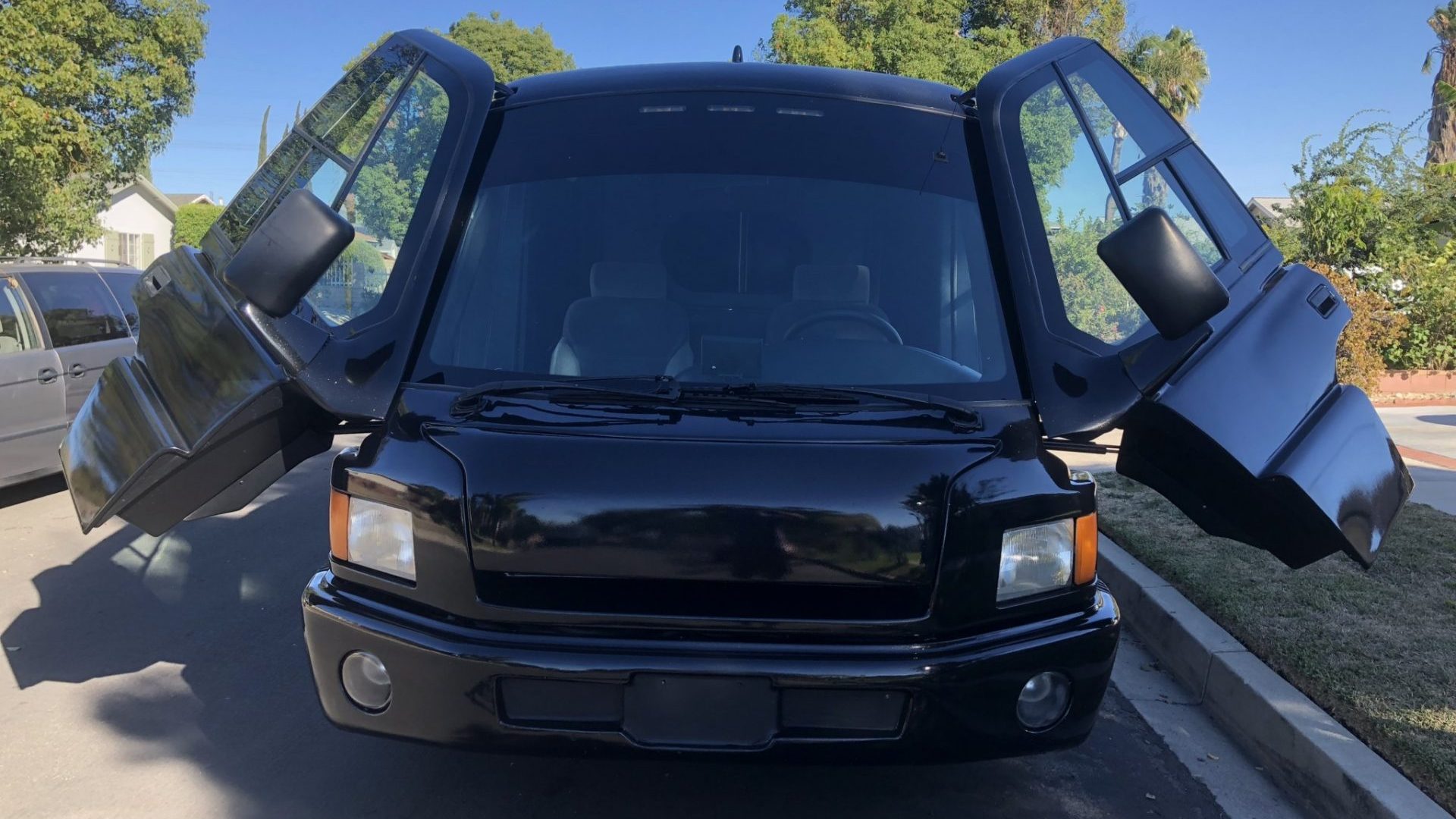 You Can Buy Whatever This Butterfly-Doored Limo Bus Thing Is Right Now
