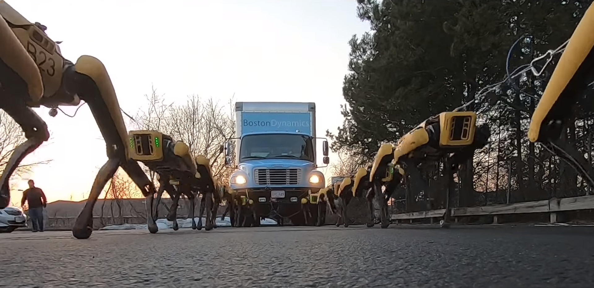 Watch This Pack of Headless Robotic Dogs Pull a Loaded Semi Truck ...