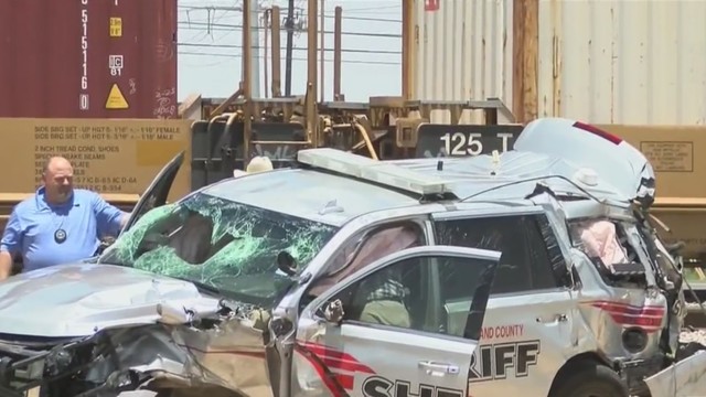 Watch Texas Deputy Attempt to Cross Train Tracks and Get Hit By a Train
